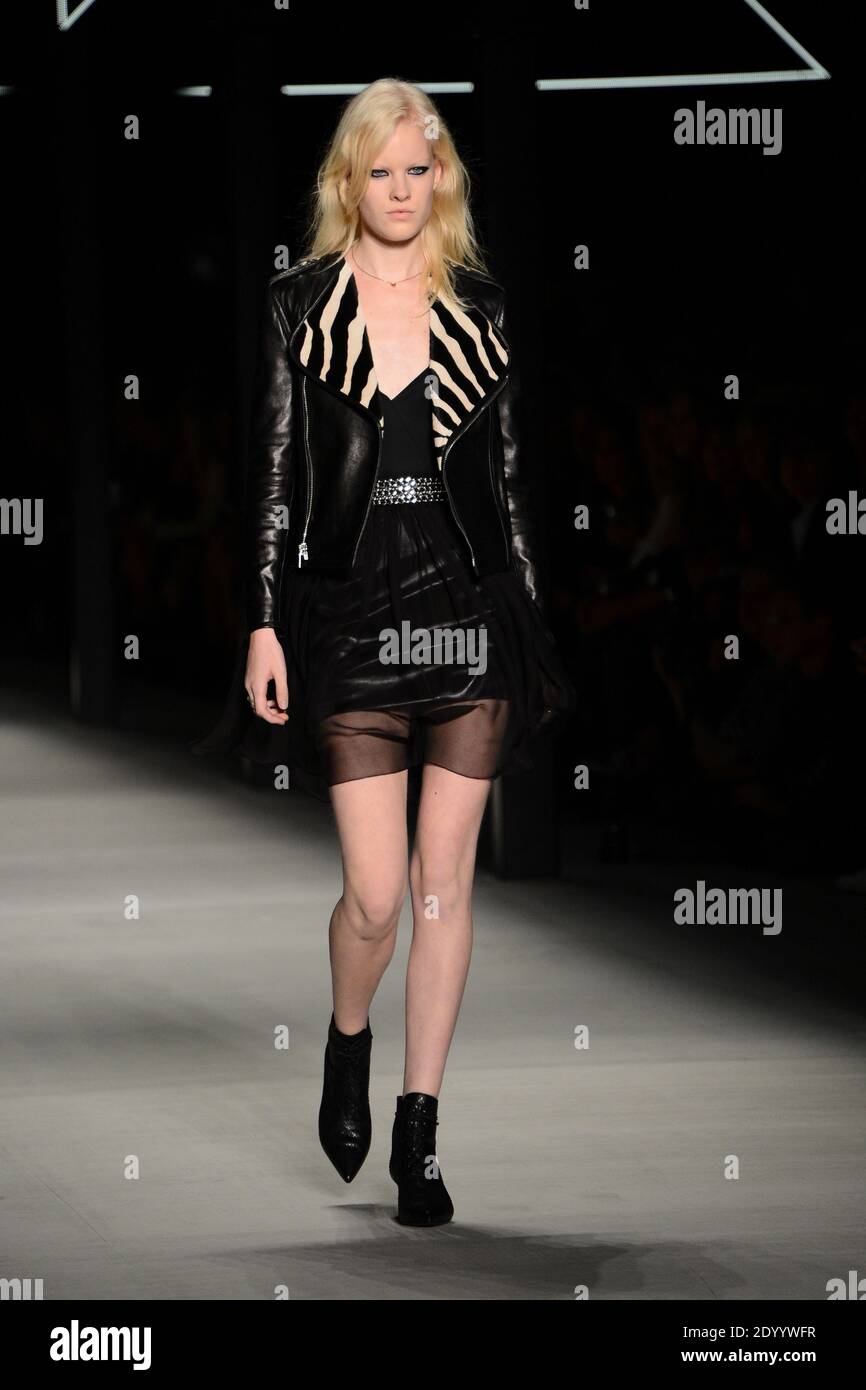 A model displays a creation by designer Hedi Slimane for Saint-Laurent ...