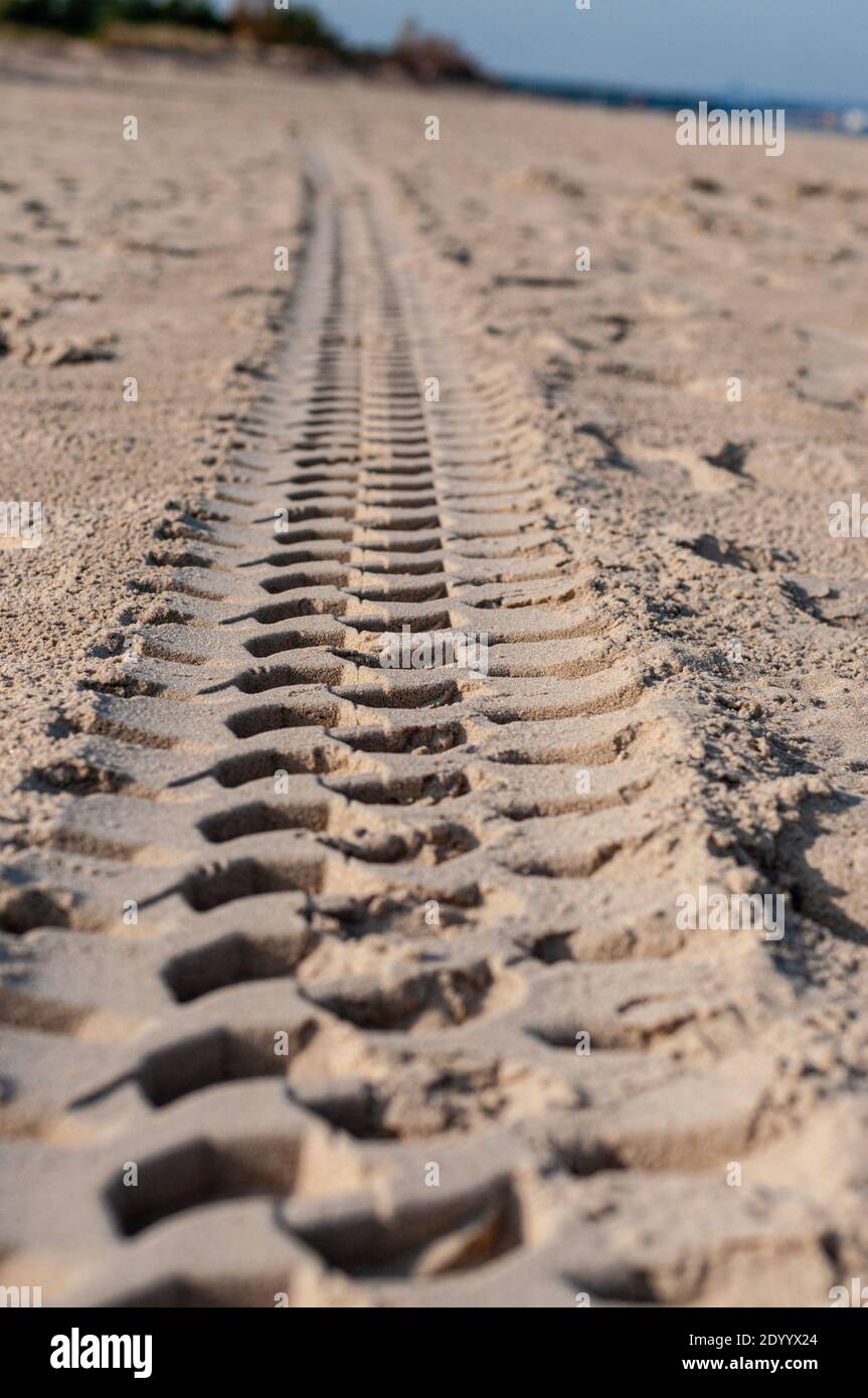 Tire marks on the sand Stock Photo - Alamy
