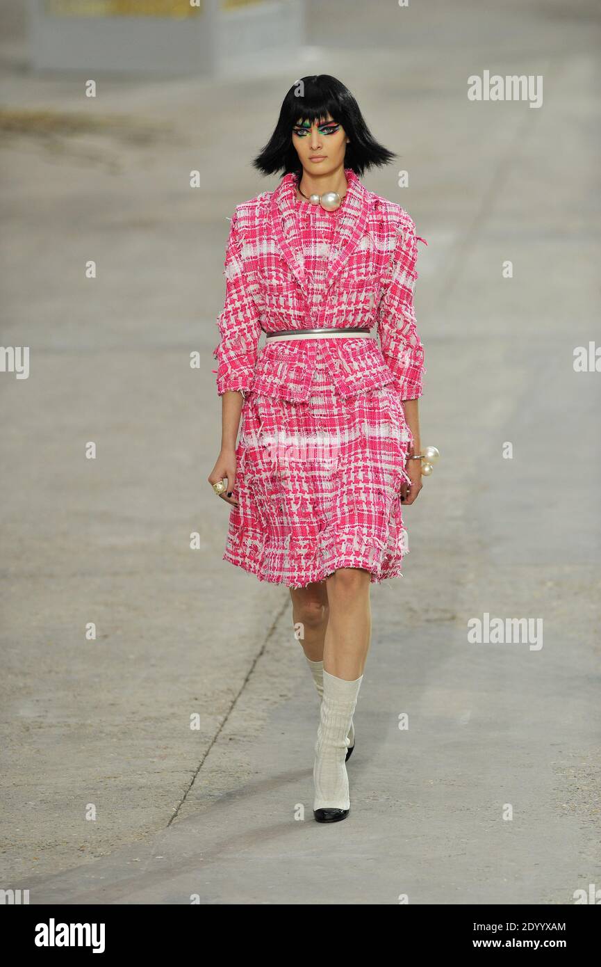 A model displays a creation by designer Karl Lagerfeld for Chanel ...