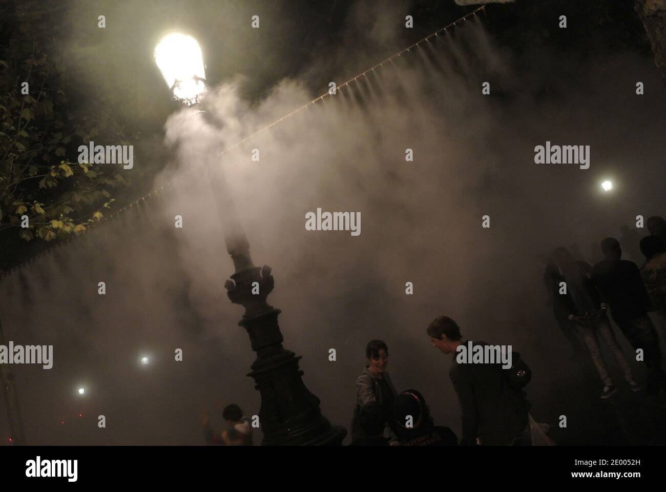 People discover 'Fog Square', a work by Japanese artist Fujiko Nakaya as part of 'Nuit Blanche ...