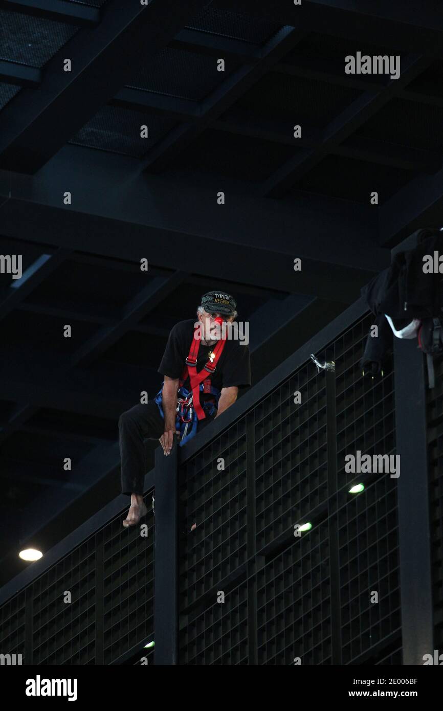 Serge Charnay stands on a wall inside the court house in Nantes, France ...