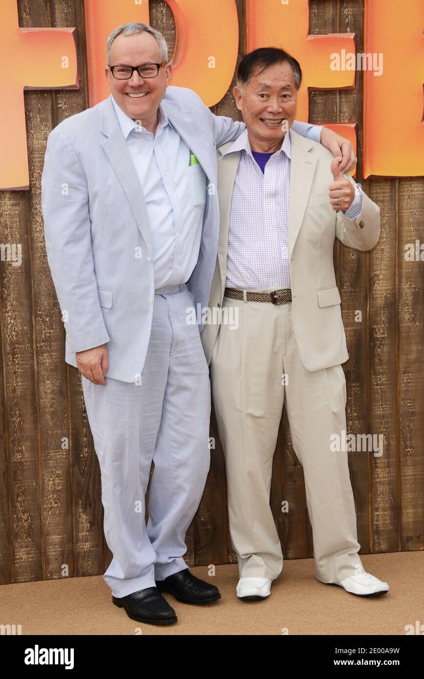 Brad Altman and George Takei arrive at the premiere of Free Birds at ...