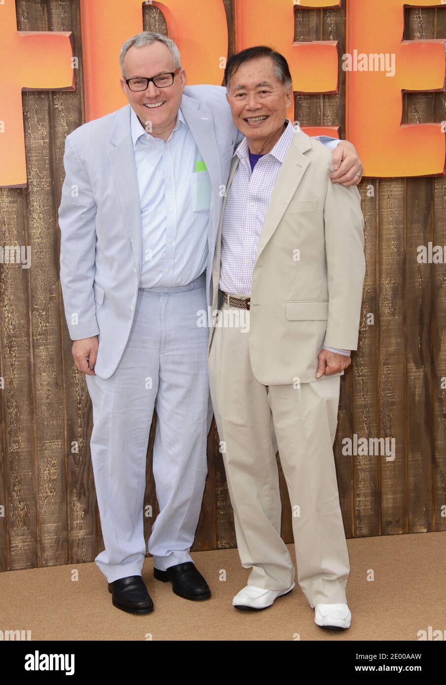 Brad Altman and George Takei arrive at the premiere of Free Birds at ...