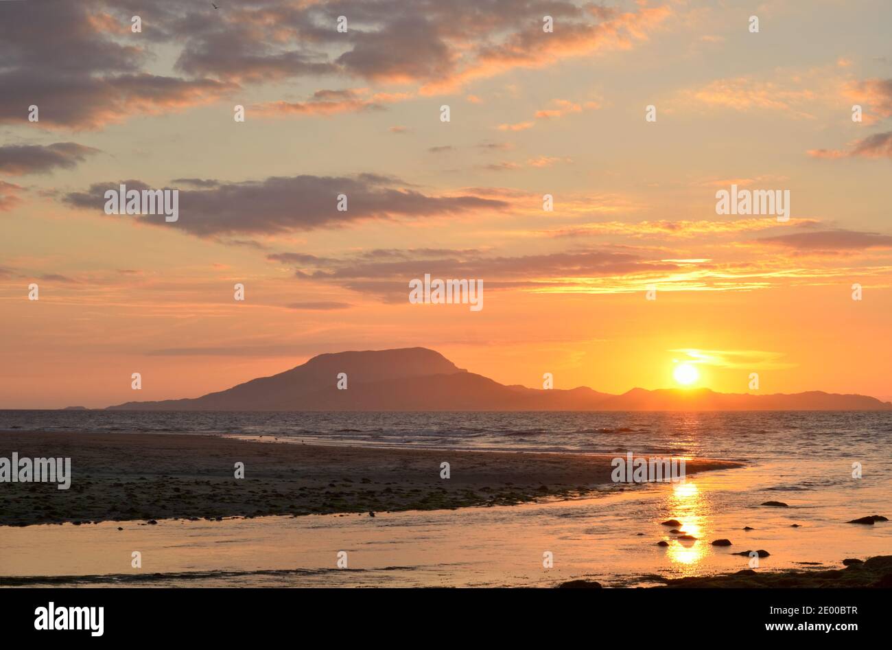 Sun sets behind Clare island,off the coast of county Mayo,Ireland ...