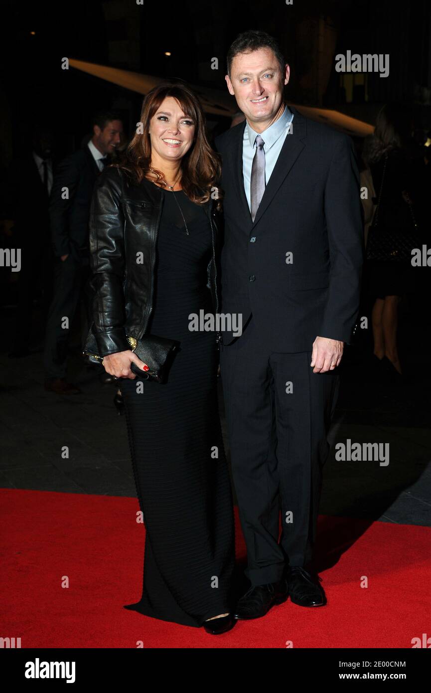 Screenwriter Jeff Pope and guest arriving for the premiere of the film ...