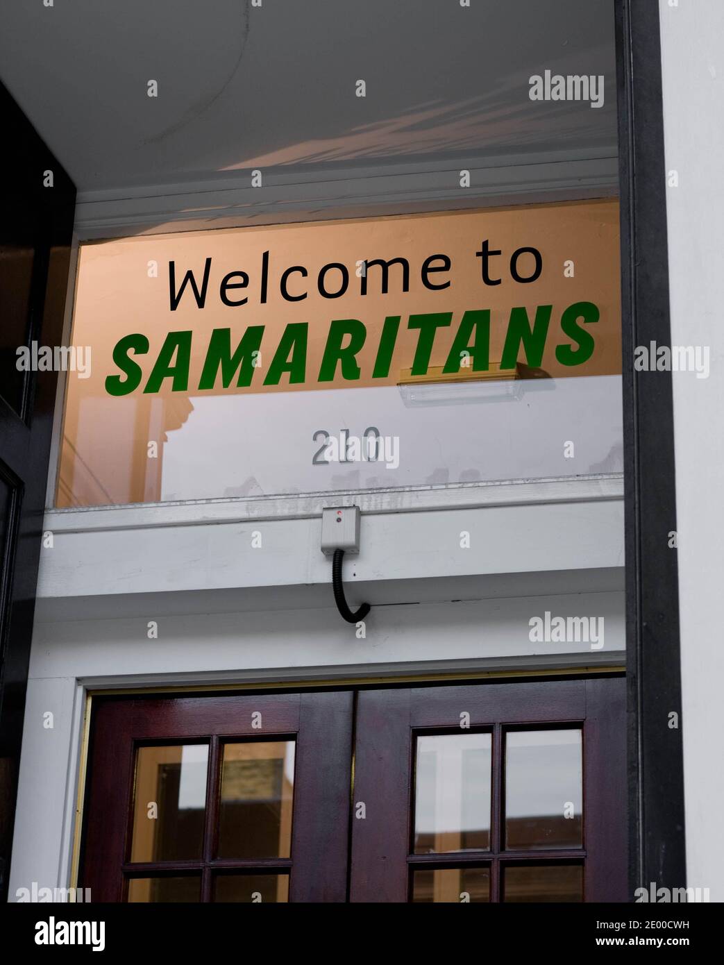 Illuminated Samaritan sign, Glasgow Scotland Stock Photo - Alamy