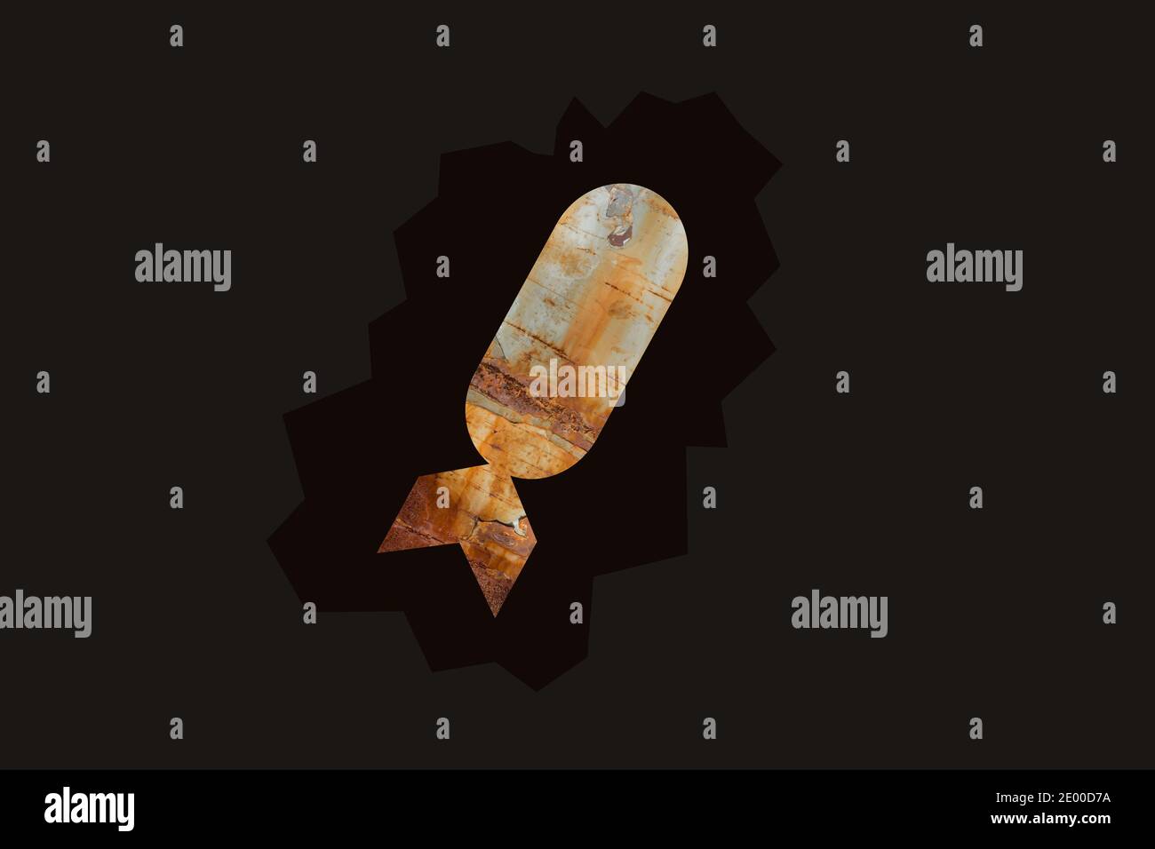 Old and aged rusty unexploded bomb and ordnance is discovered in thole ...