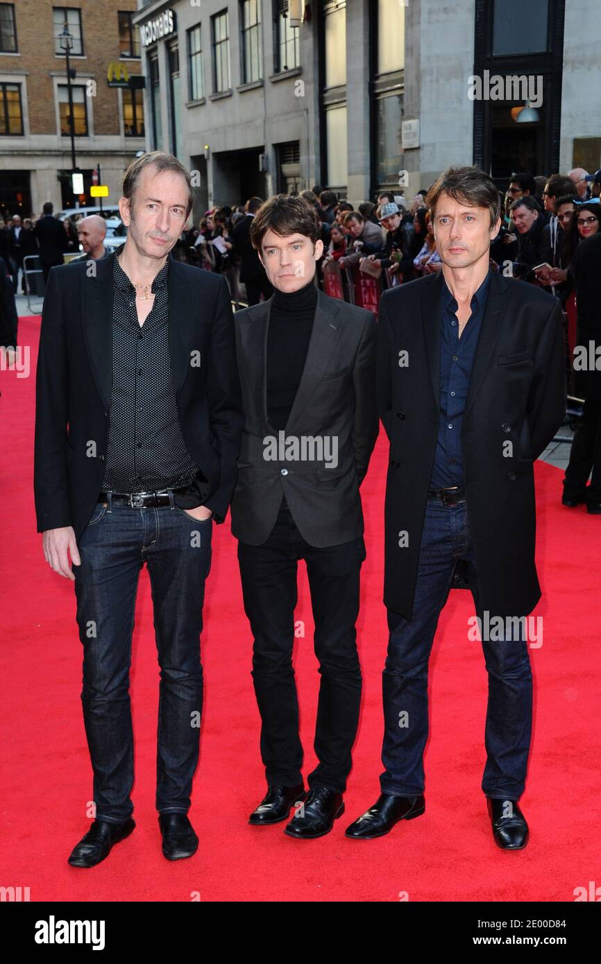Suede band members, Mat Osman, Neil Codling and Brett Anderson arriving for the premiere of the ...