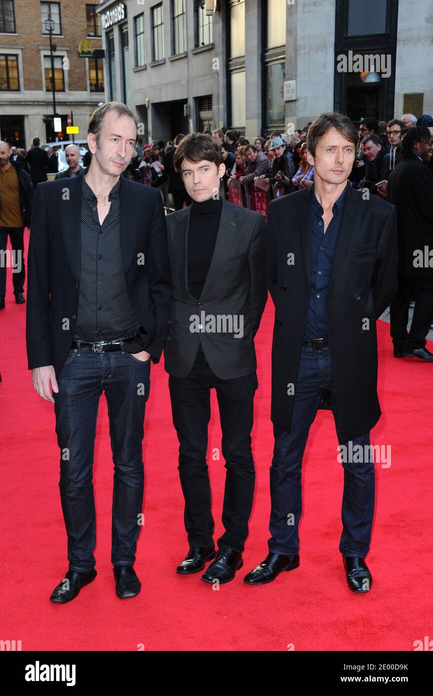 Suede band members, Mat Osman, Neil Codling and Brett Anderson arriving ...