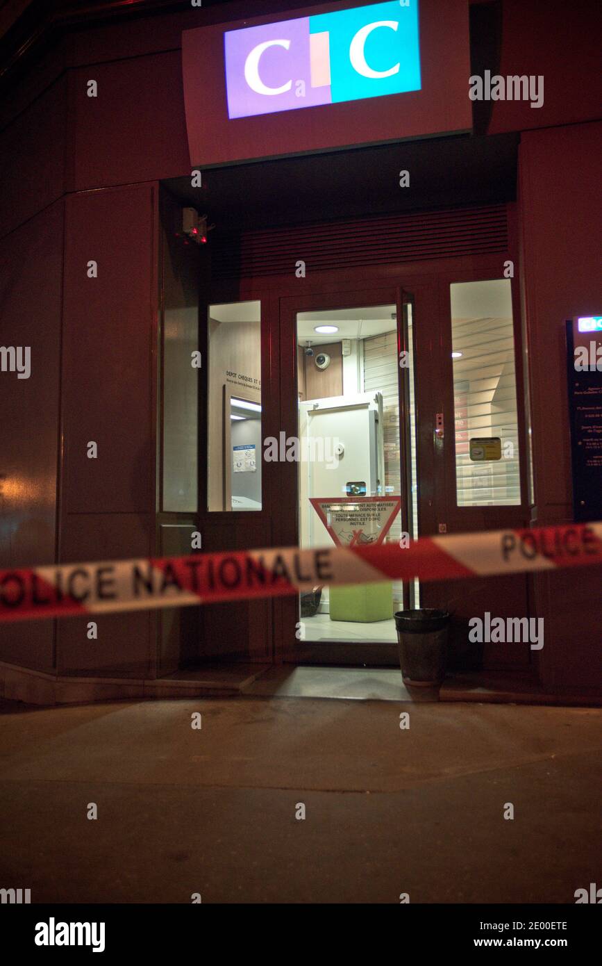 Atmosphere outside a CIC bank where an armed men hold four people as ...