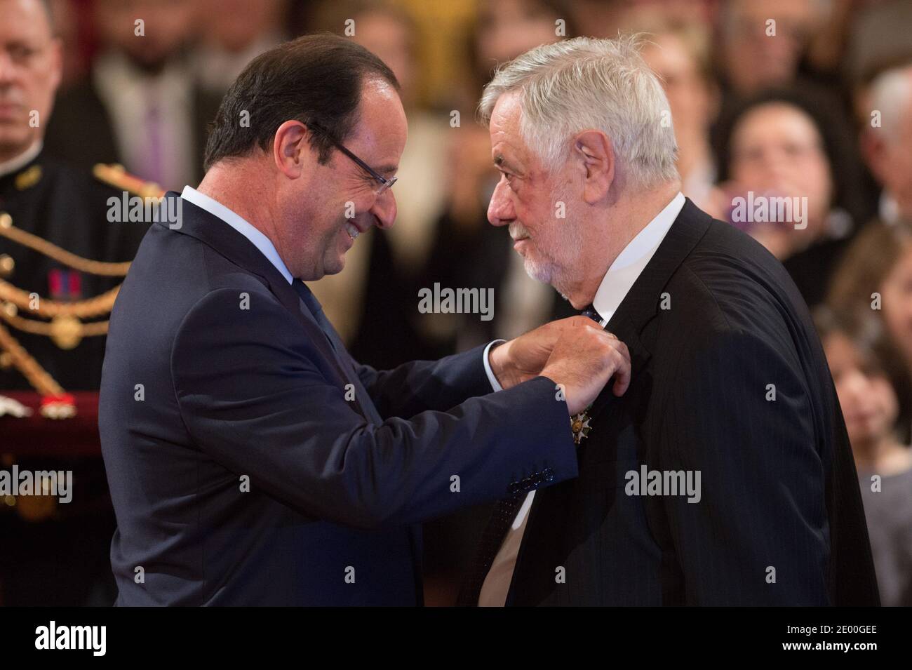 President Francois Hollande presents Paleontologist Yves Coppens with ...
