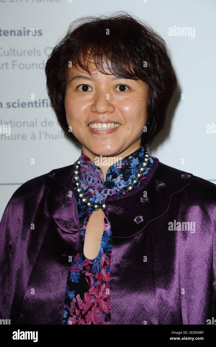 Deng Xi Hong attending the 'CHIFRA' Exhibition Opening on the Champs ...