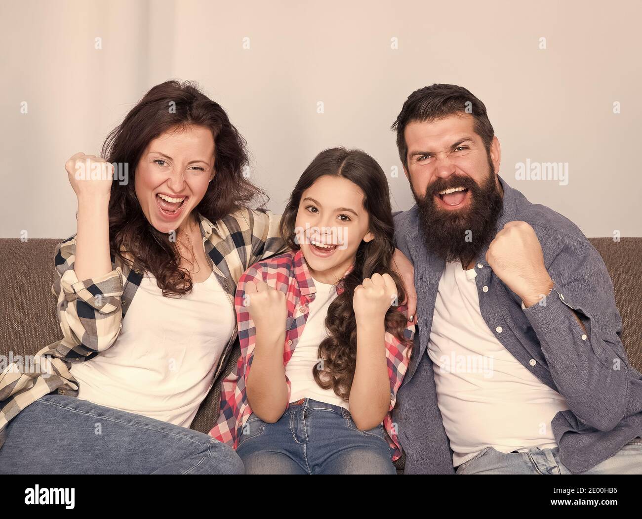 Together we are winners. Winners celebrate victory at home. Happy ...