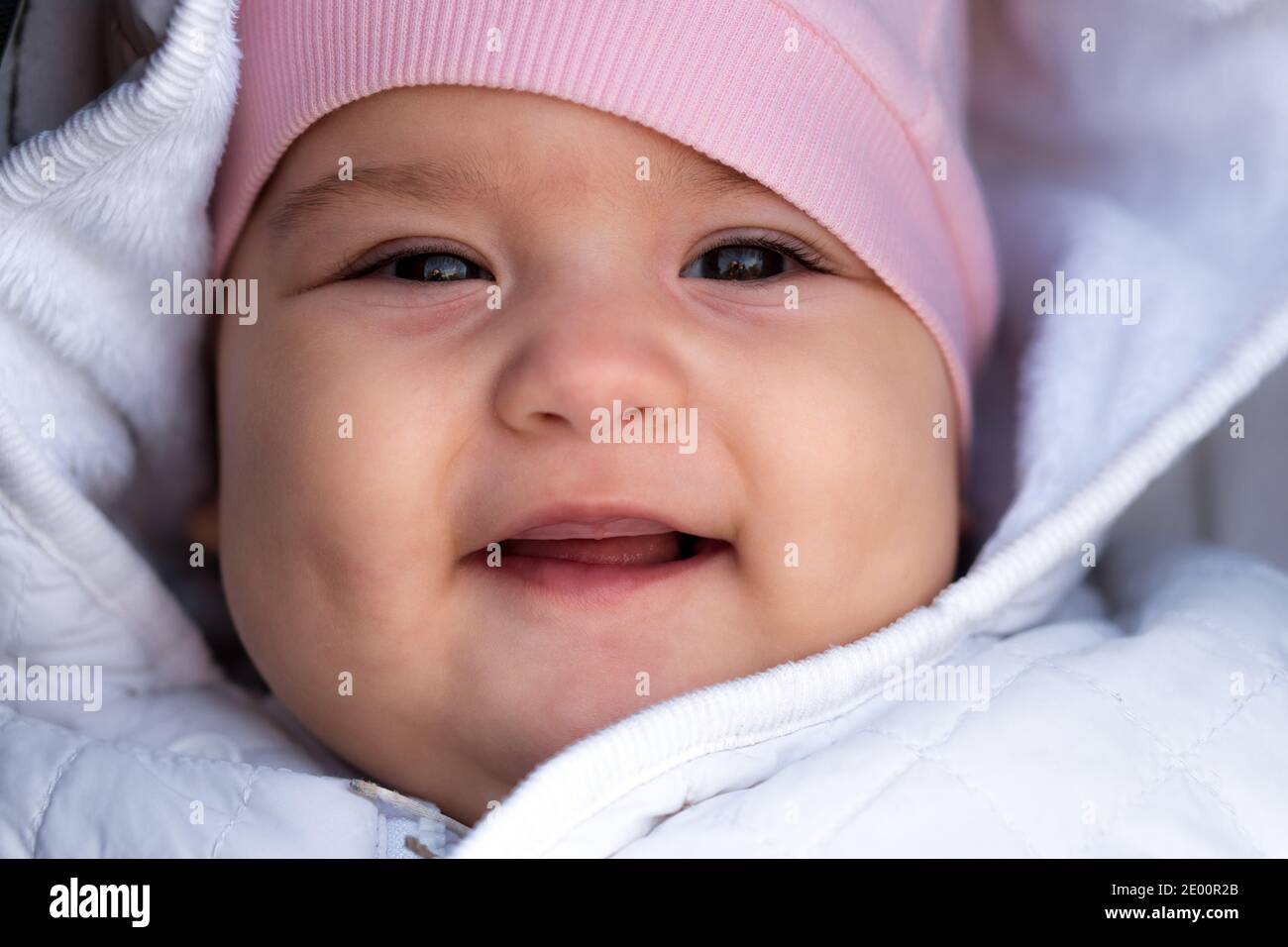 Cute Newborn Baby Girl With Brown Eyes