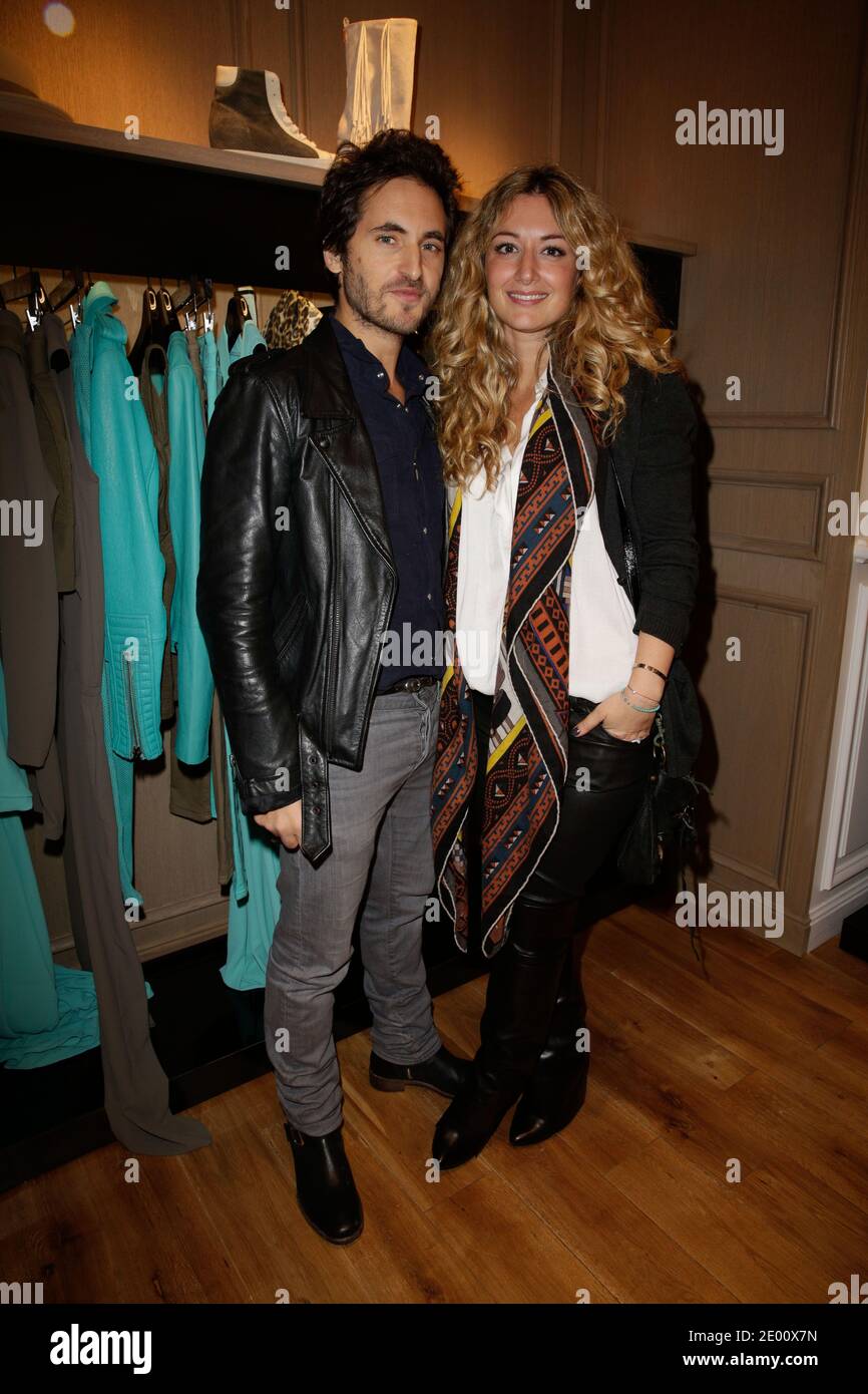 Mickael Miro and his wife attending the Hotel Particulier Store Opening ...