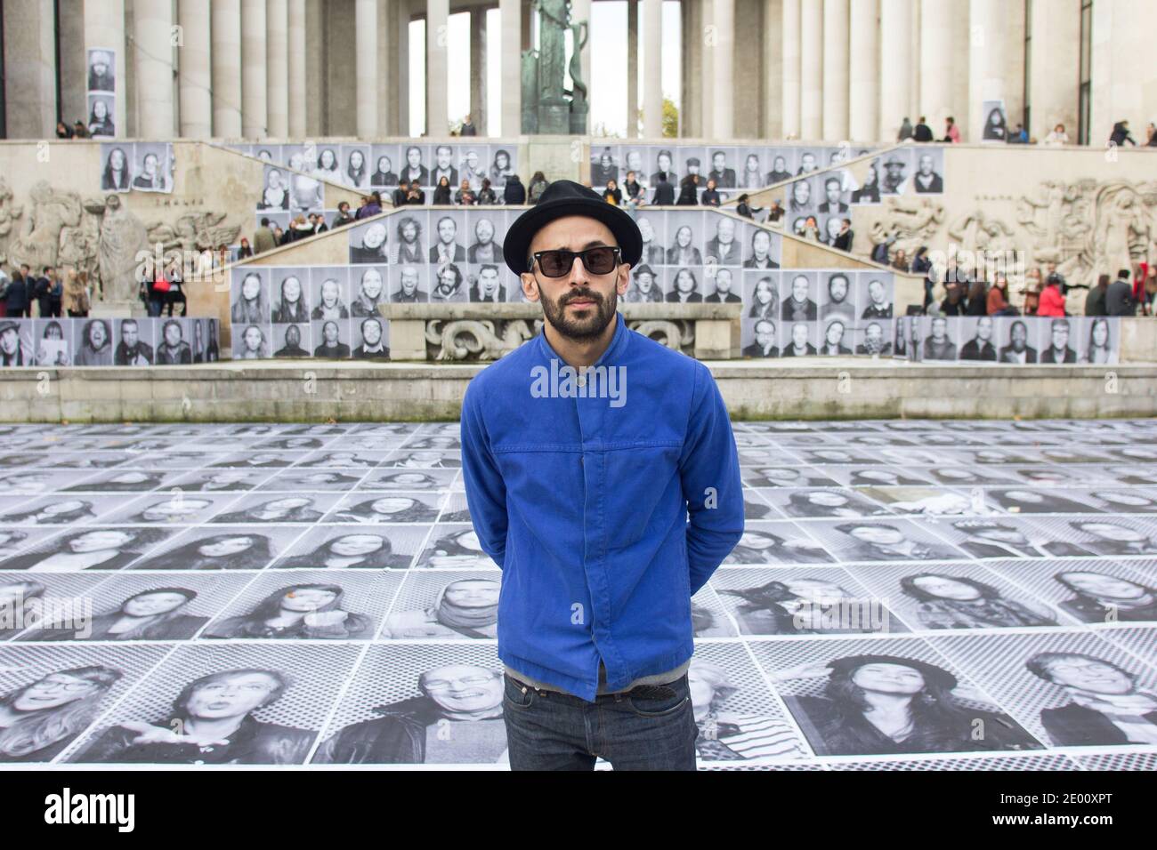 French artist JR poses in front of his public art installation at the ...