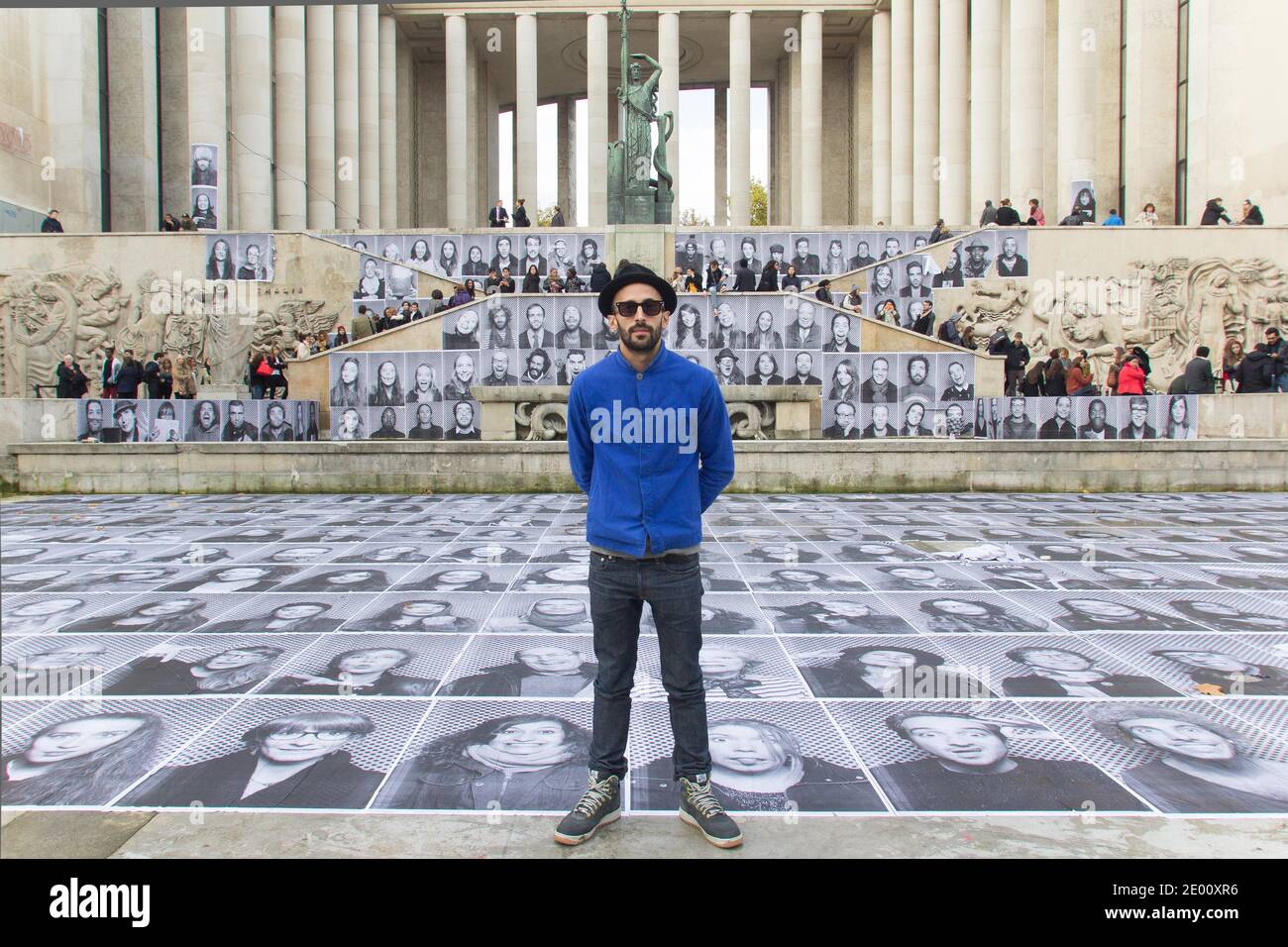 French artist JR poses in front of his public art installation at the ...