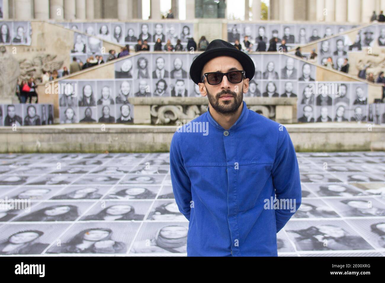 French artist JR poses in front of his public art installation at the ...