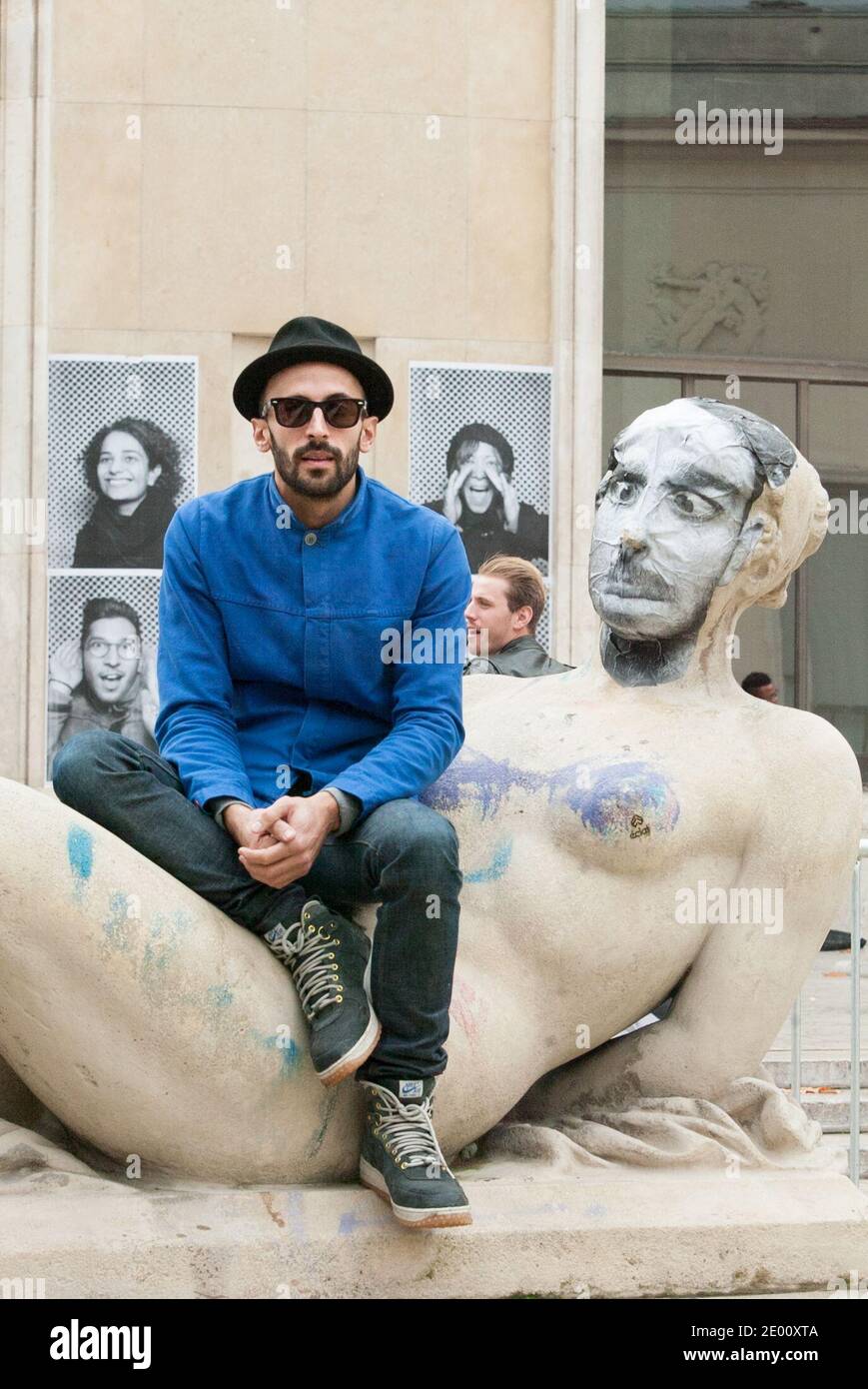 French artist JR poses in front of his public art installation at the ...