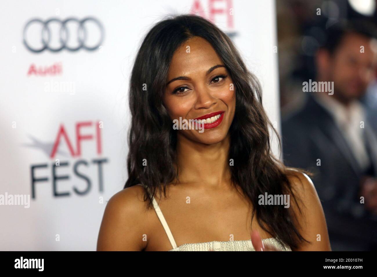 Zoe Saldana arrives to the premiere of Out Of The Furnace in Hollywood ...