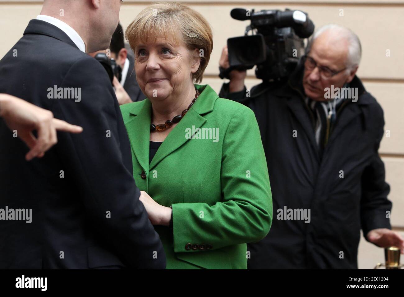 German Chancellor Angela Merkel attends a meeting on youth unemployment ...
