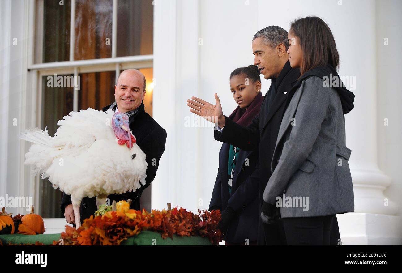 U.S. President Barack Obama flanked with daughters Sasha Obama and ...