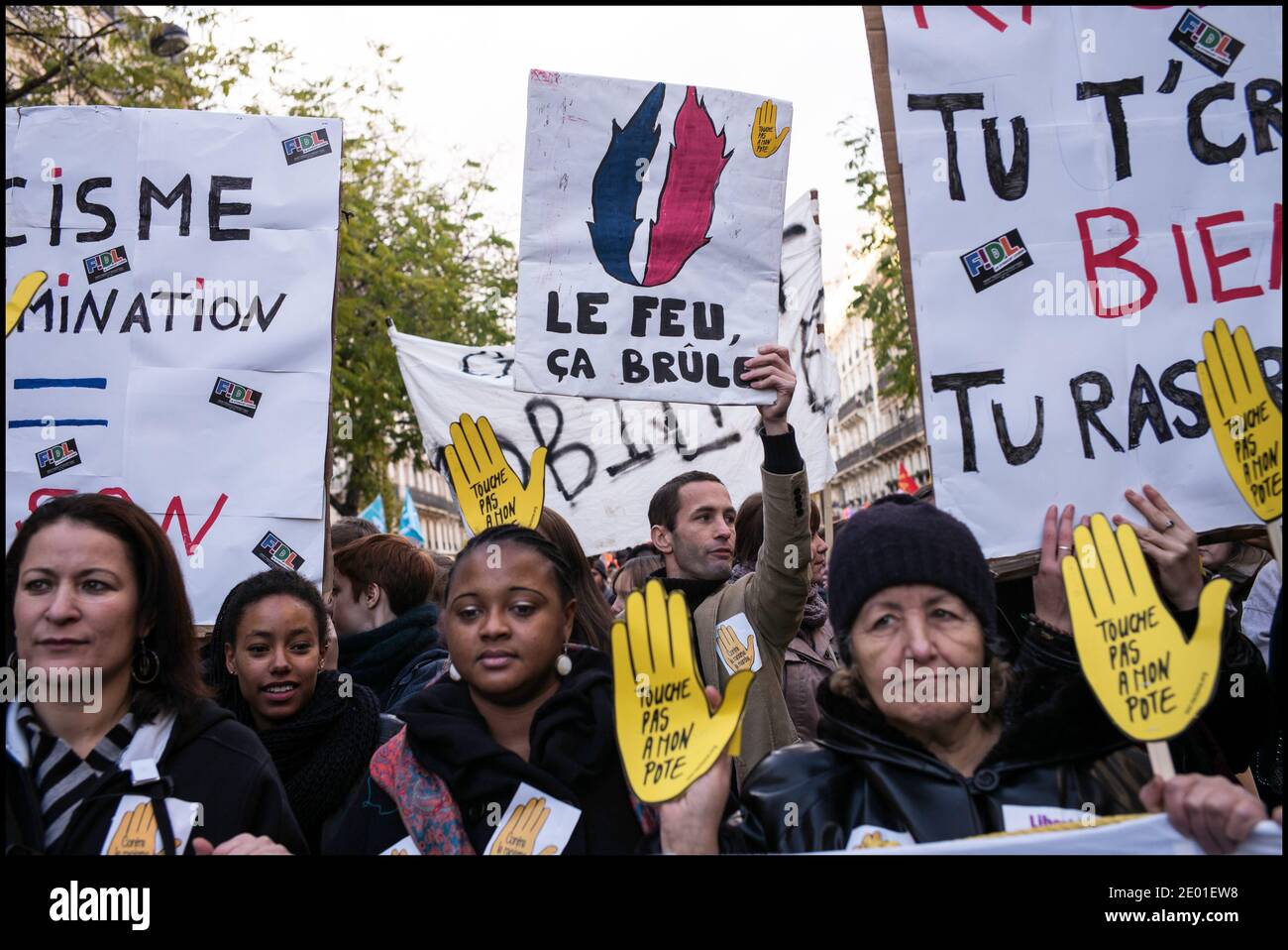 People take part in a march against racism in Paris, France, on ...