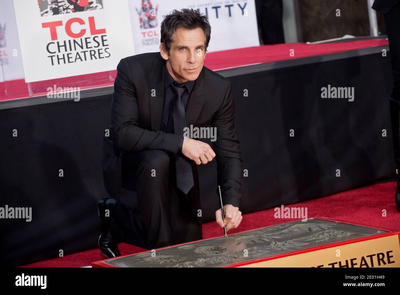 Ben Stiller poses as he is honored with a hand and footprint ceremony ...