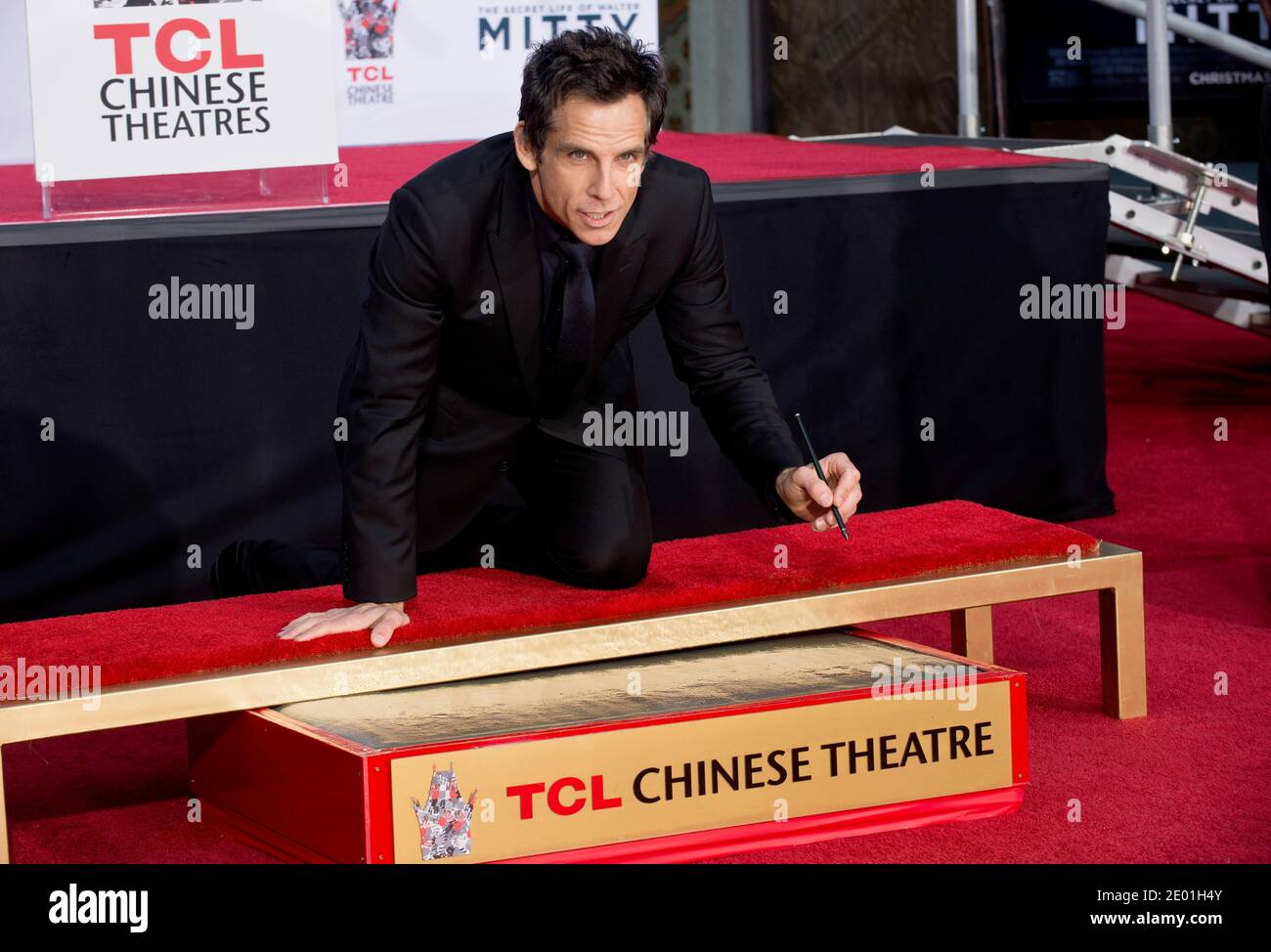 Ben Stiller poses as he is honored with a hand and footprint ceremony ...