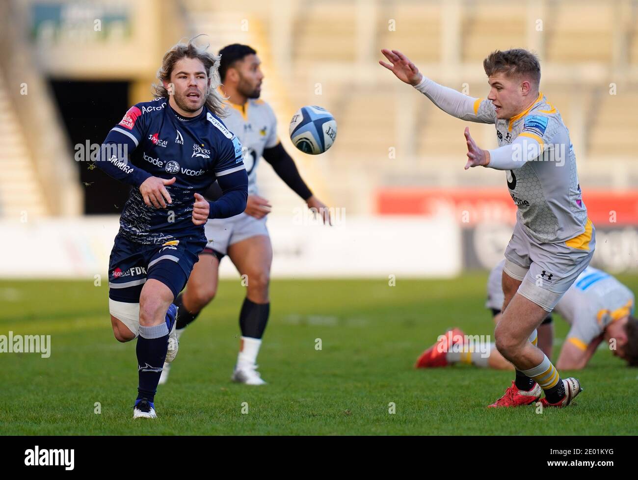 Wasps fly-half Charlie Atkinson tried to block a pass by Sale Sharks ...