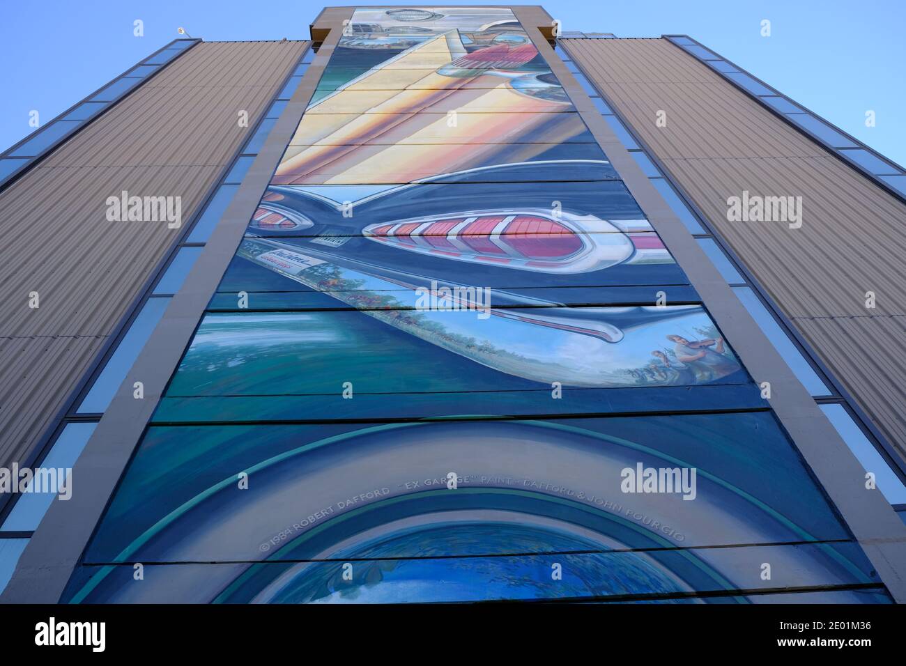 Crazy mural of some cars on the side of a building in downtown ...