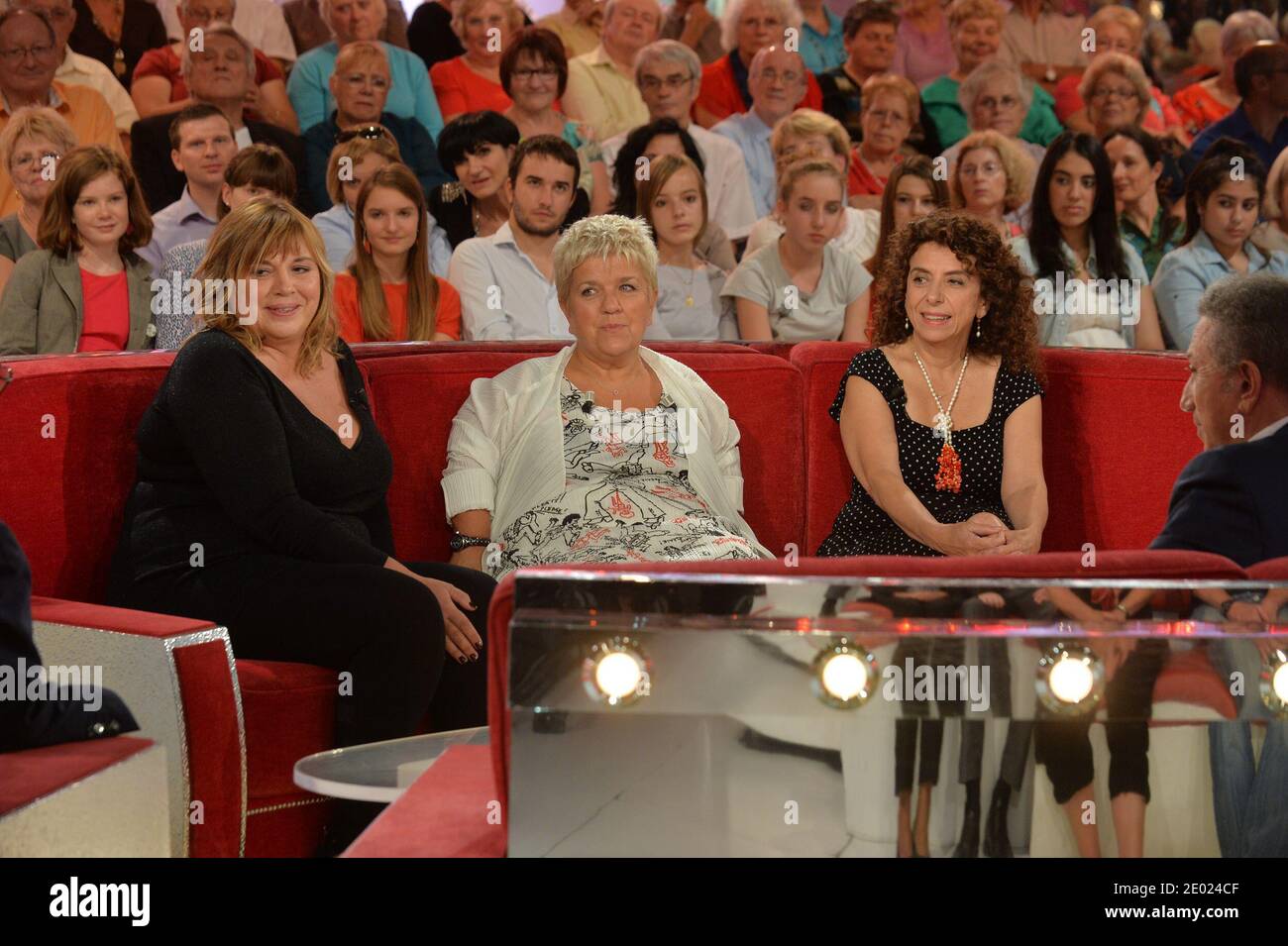 Mimie Mathy, flanked by Michele Bernier and Isabelle de Botton, at the ...