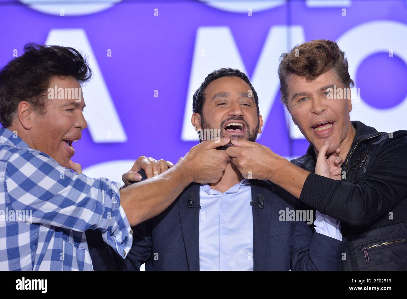 Igor et Grichka Bogdanoff and Cyril Hanouna at the taping of 'Touche ...