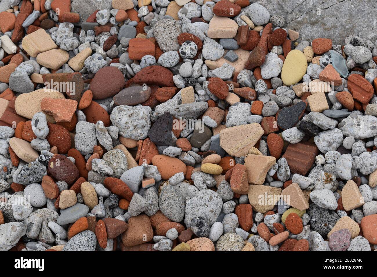 Coloured rocks along the water side of Lake Ontario Stock Photo - Alamy