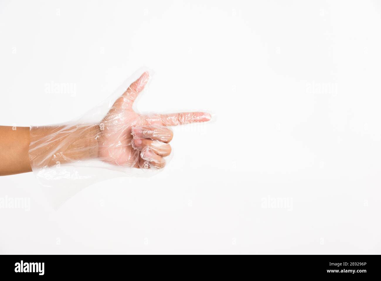 Woman hand wearing single use protect disposable transparent plastic ...