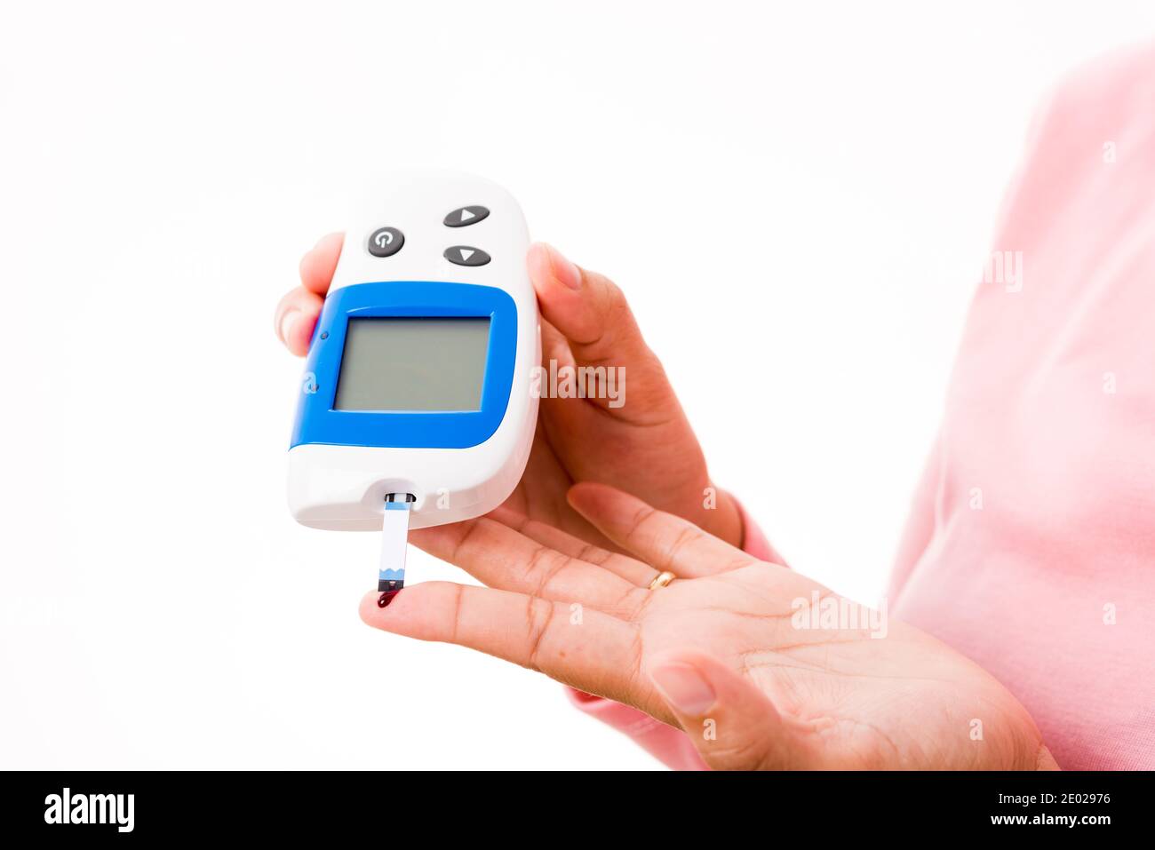 Closeup hands woman measur glucose test level check with blood on ...