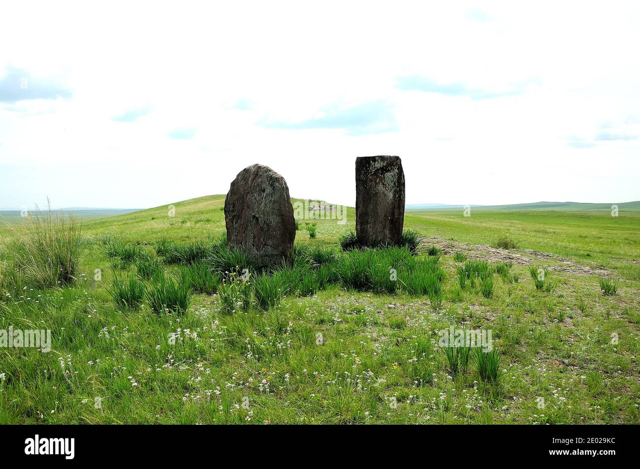 Ancient sacral stones at the entrance to the endless steppe. Gateway to ...