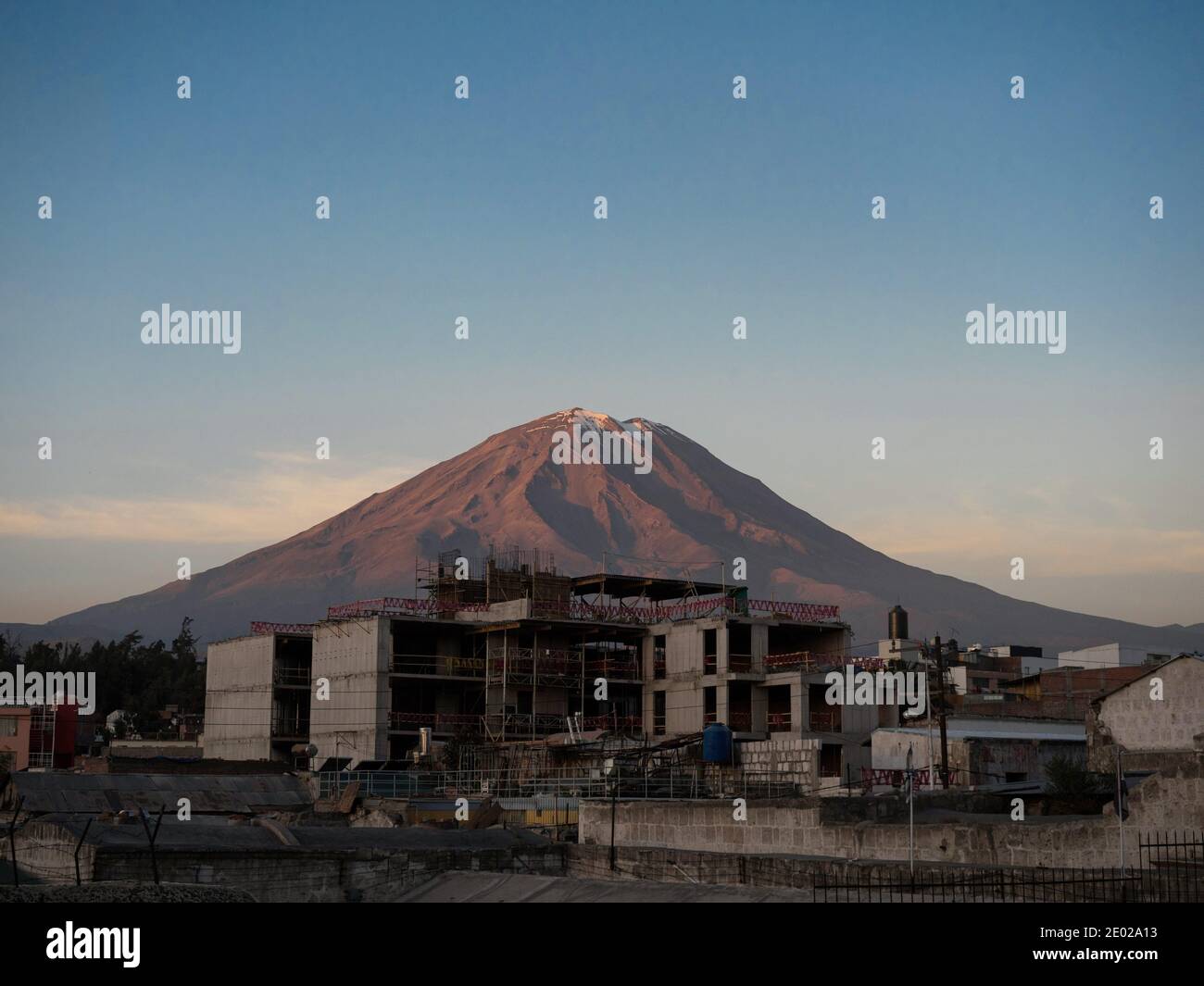 Symmetrical cone-shaped snow-capped stratovolcano El Misti seen from ...