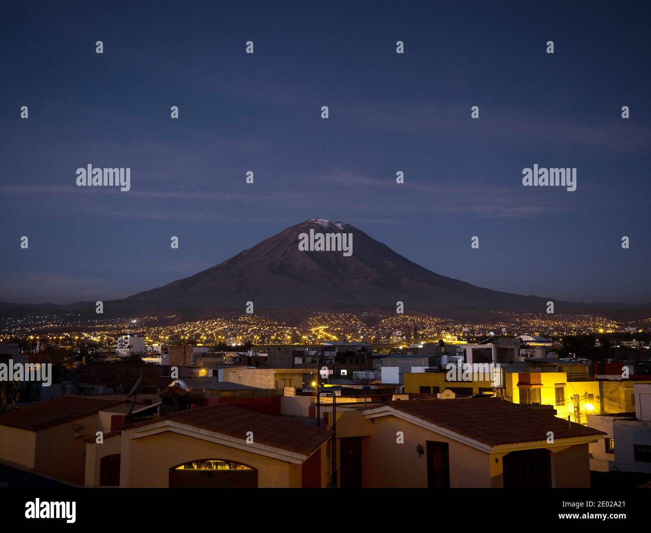 Symmetrical cone-shaped snow-capped stratovolcano El Misti seen from ...