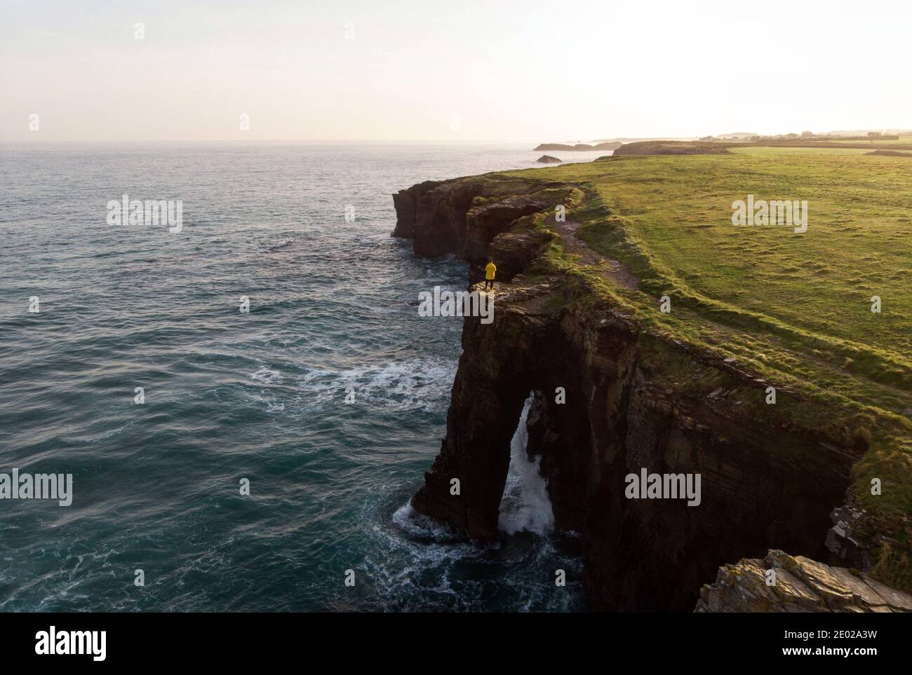Aerial view of massive natural arches at Praia as Catedrais Cathedrals ...