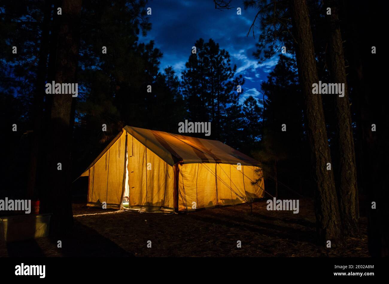 Illuminated Tent at campsite at night Stock Photo - Alamy