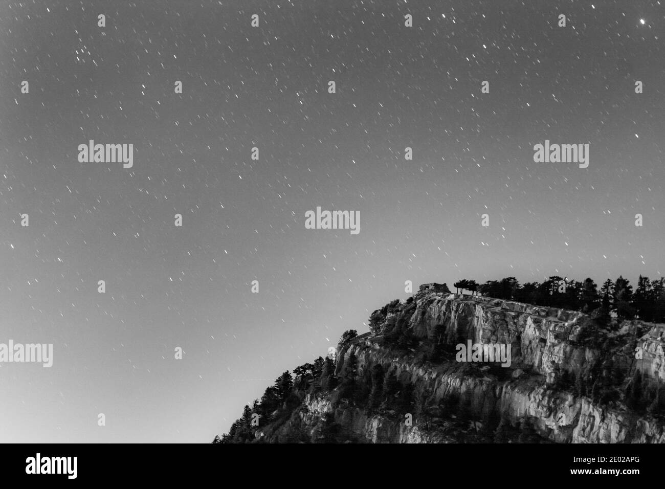 Cabin on Sandia Crest as seen in black and white at night Stock Photo ...