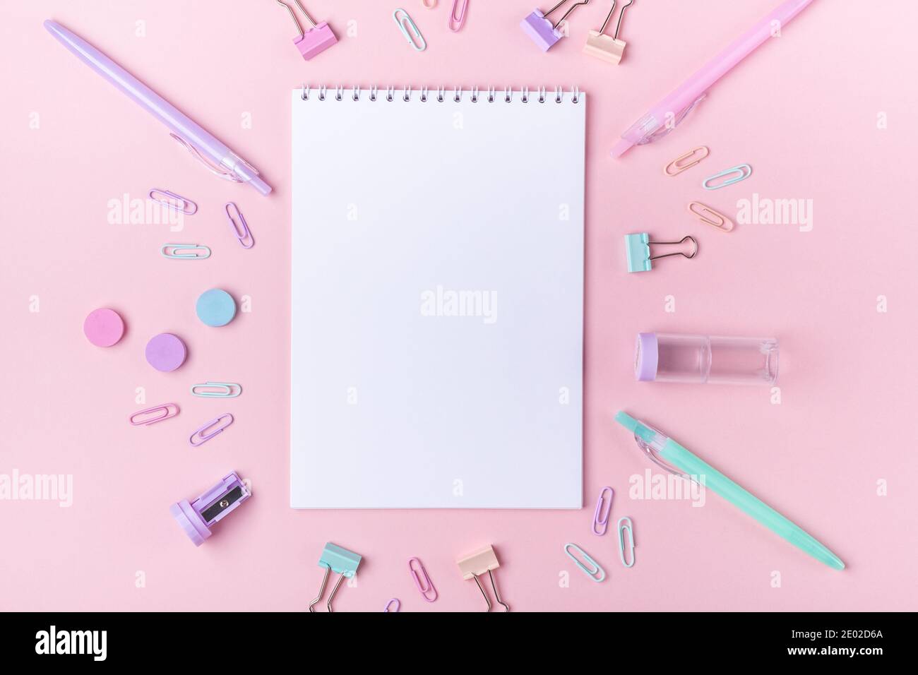 School background with notebooks and pastel colorful study accessories ...