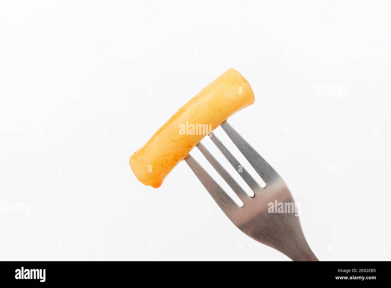 Red Tteokbokki on white background Stock Photo - Alamy