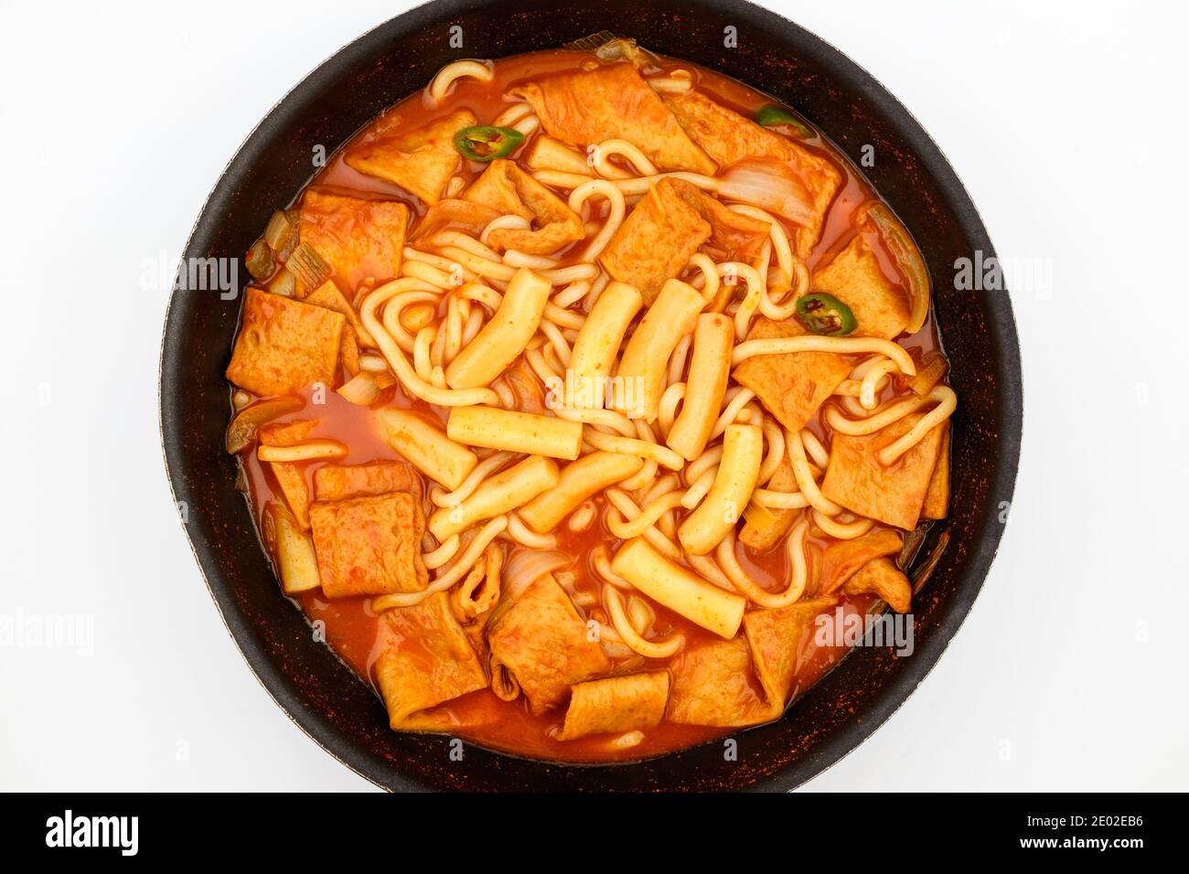 Red Tteokbokki on white background Stock Photo - Alamy