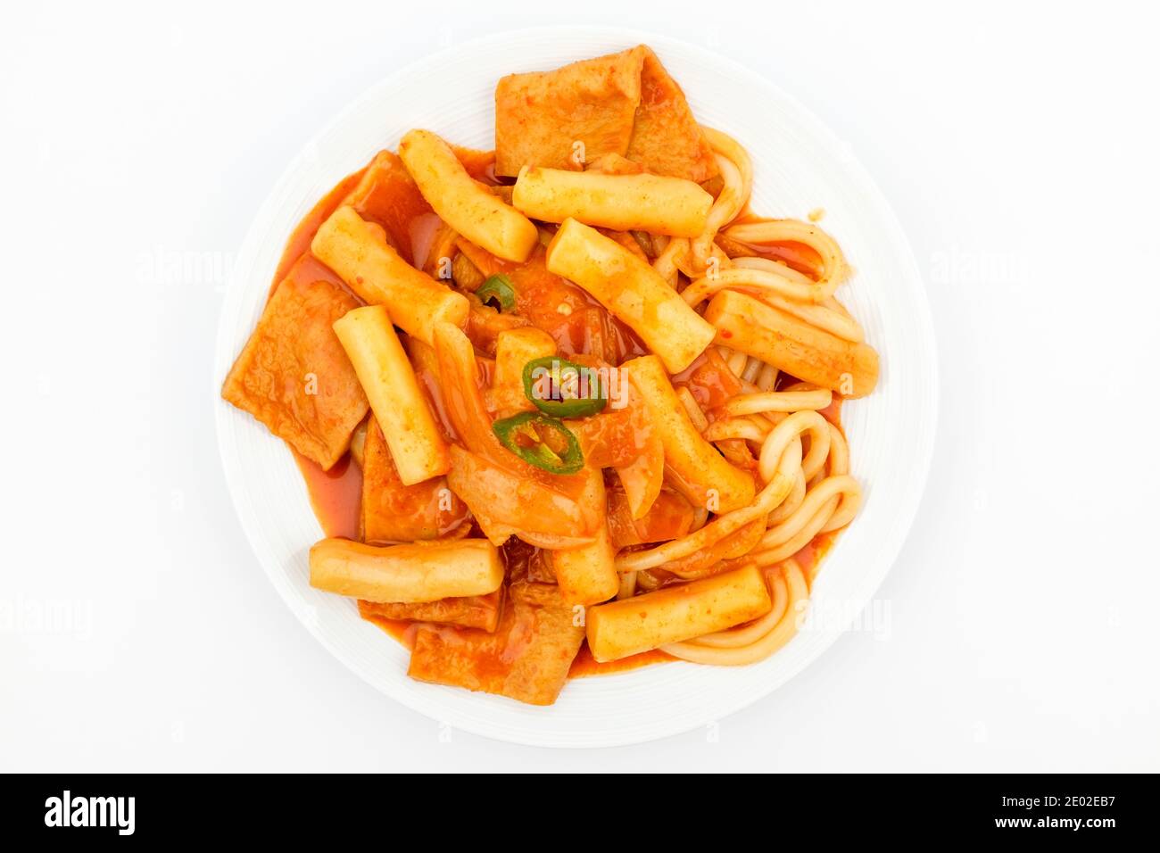Red Tteokbokki on white background Stock Photo - Alamy