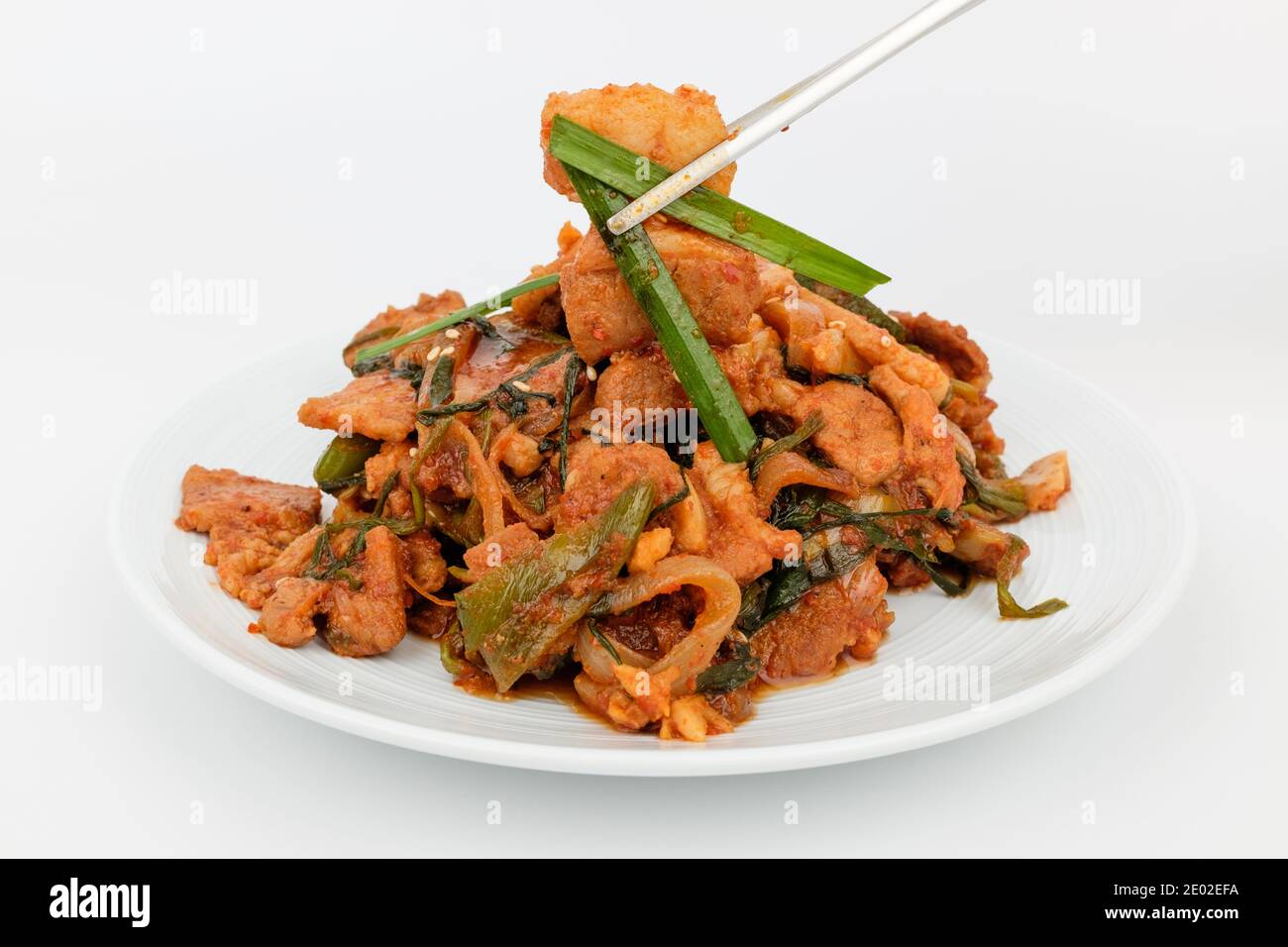 Stir-fried meat on white background Stock Photo - Alamy