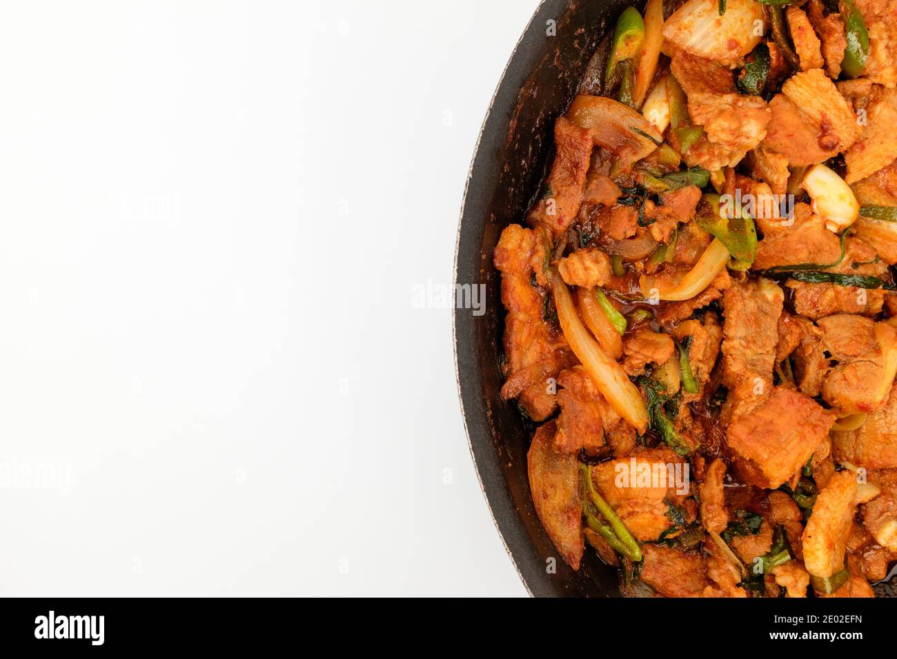 Stir-fried meat on white background Stock Photo - Alamy