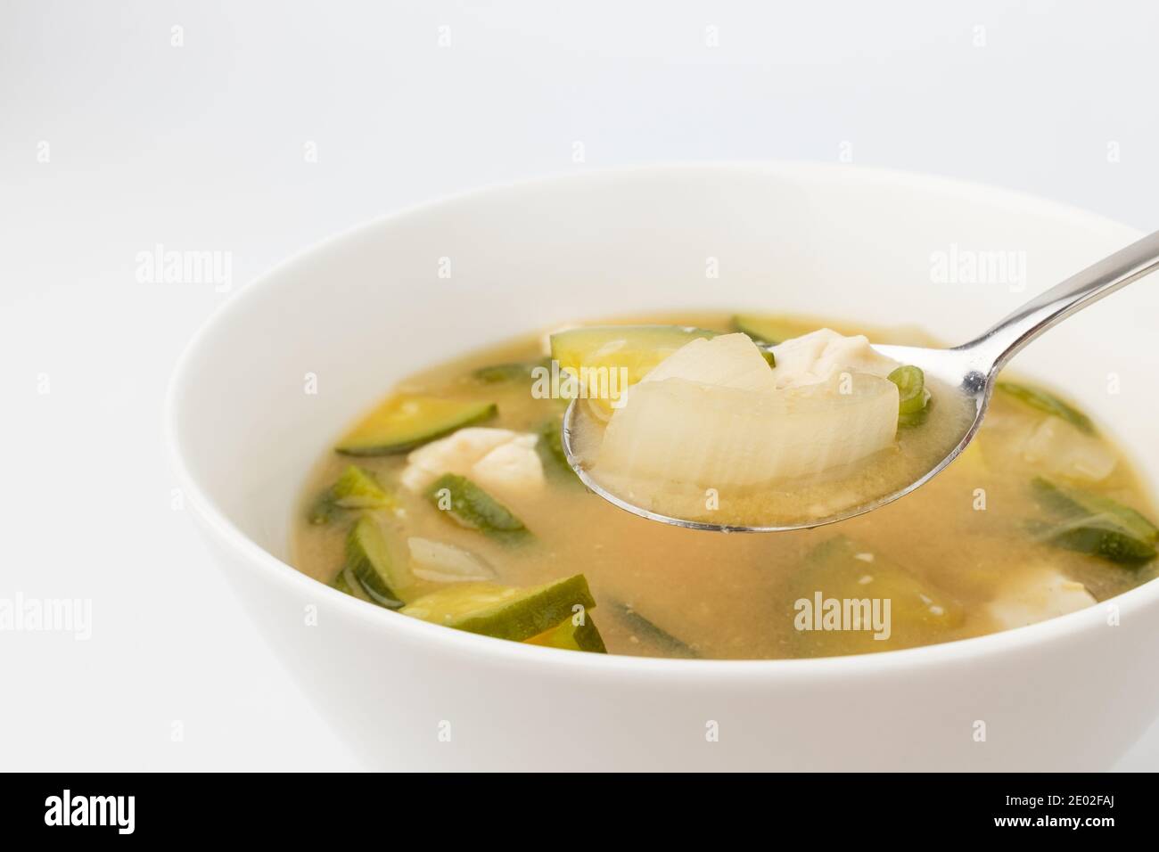 Miso stew on white background Stock Photo - Alamy