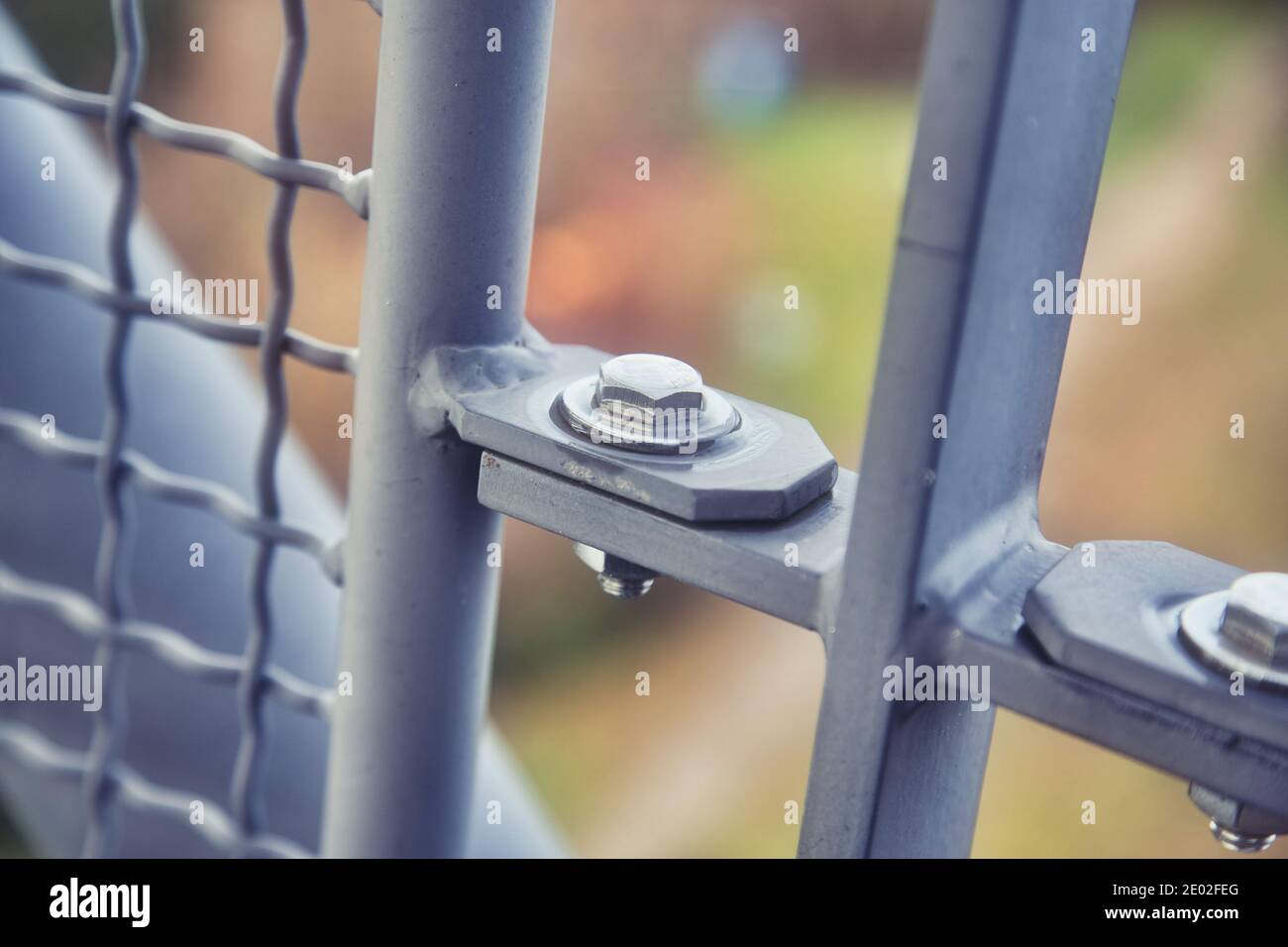 screws on a metal railing Stock Photo - Alamy